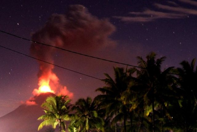 Indonesia’s Mount Soputan erupts after devastating quake ...